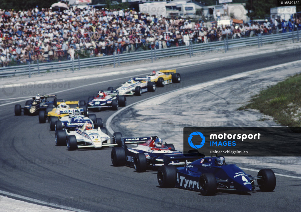 Brian Henton Tyrrell 011 Ford Leading A Train Of Cars Including